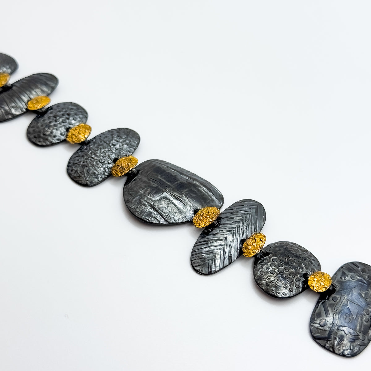 Pebble Bracelet in Oxidized Sterling and 22k Gold - Raiford Gallery Inc